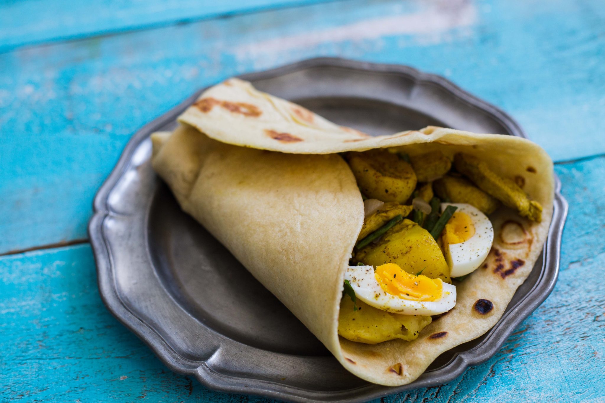 Recept: Surinaamse roti met massala kip en kousenband - ®Surinaams ...